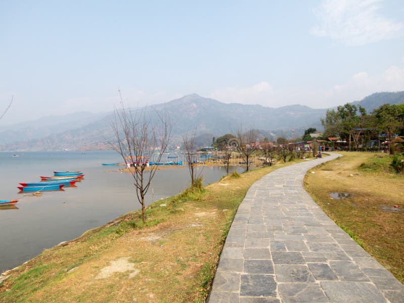 Pathway beside Lake editorial stock photo. Image of mountains - 67897643