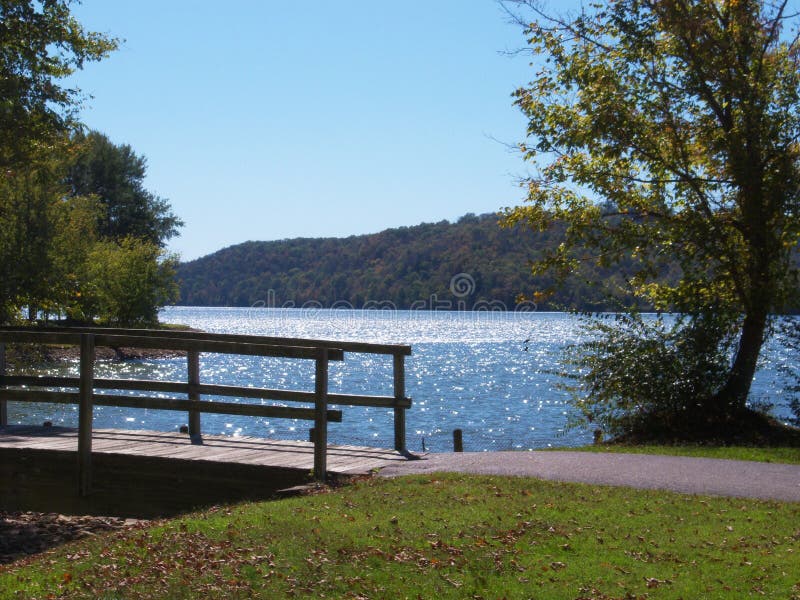 Pathway beside lake stock photo. Image of glistening - 54854480