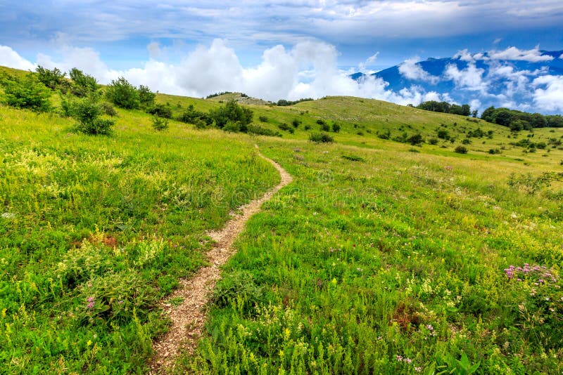 Pathway between Mountains with a View. Stock Photo - Image of track ...