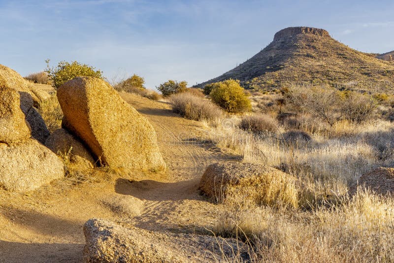 Pathway Surrounded by Hills, Rocks and Dry Grass Stock Photo - Image of ...