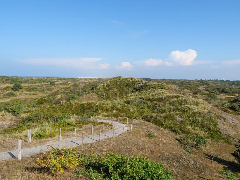 Pathway in Terrain Landscape Under Blue Cloudy Sky in Spiekeroog Town ...