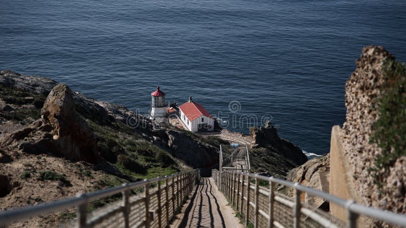 Pathway Toward a Lighthouse Near the Ocean Stock Photo - Image of wave ...