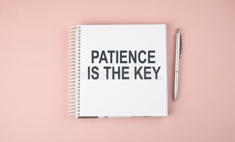 PATIENCE is the KEY Text on Notebook with Pen on the Pink Background ...