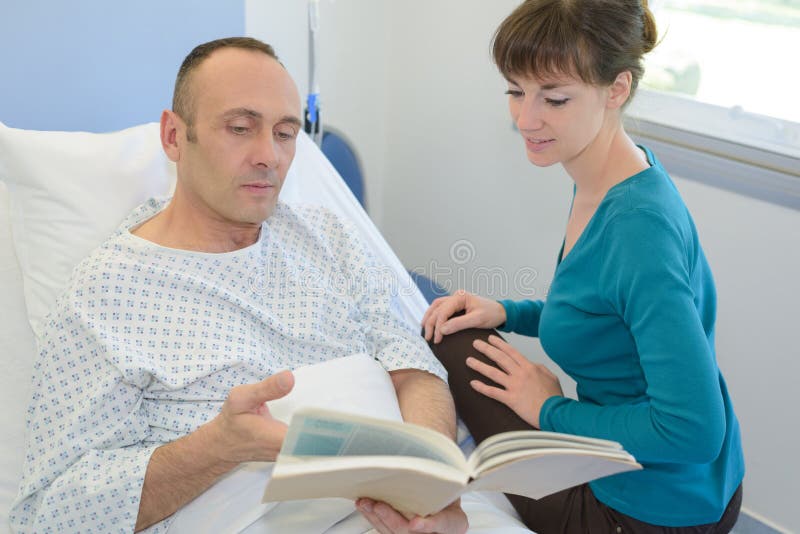 Patient in Bed Reading Book Stock Image - Image of clinic, person ...