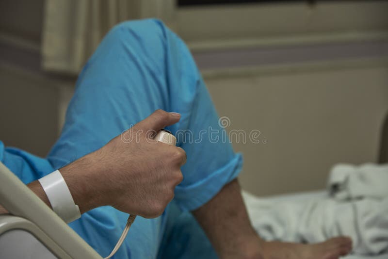 A Patient Pressing a Button Calling for Nurse Stock Image - Image of ...
