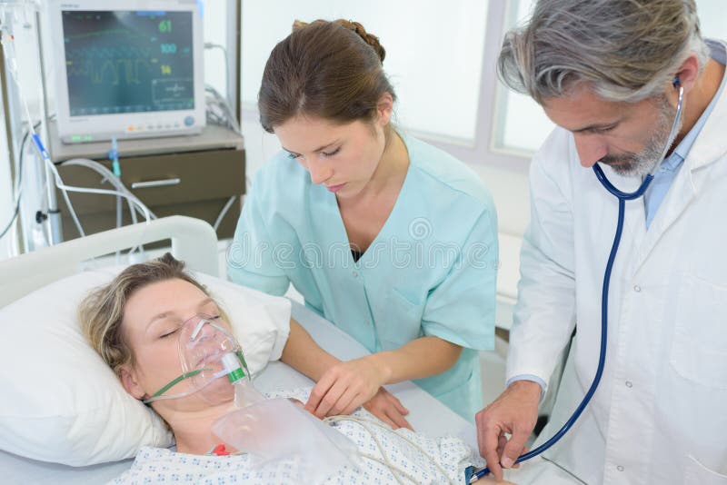 Patient on breathing mask stock image. Image of examination - 120354863