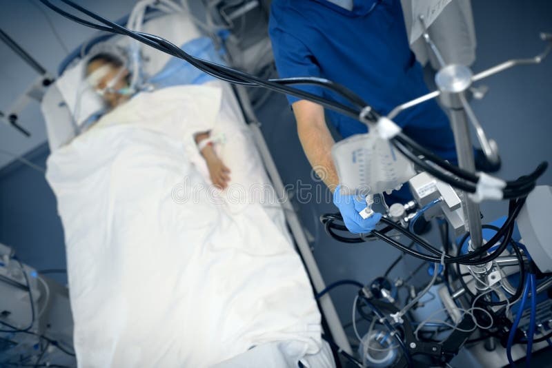 Patient in Critical Condition in the ICU Stock Photo - Image of ...
