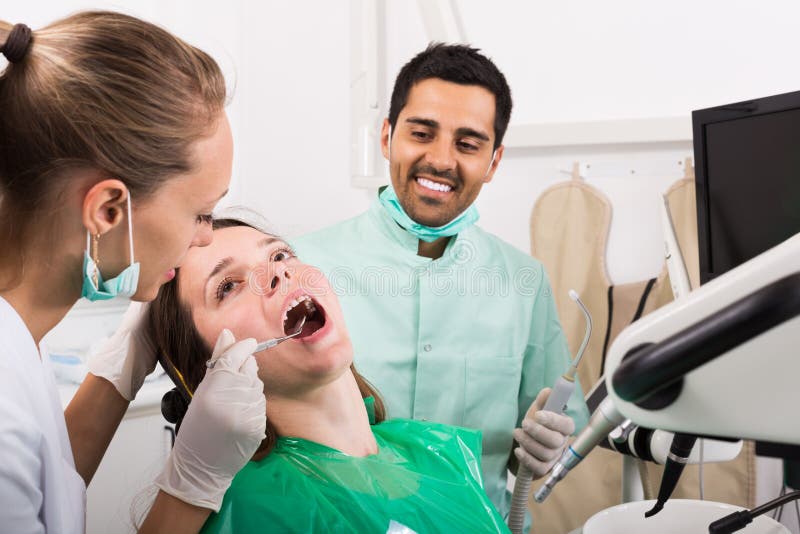 Patient Checking Out Her Teeth at Dentist Stock Photo - Image of cure ...