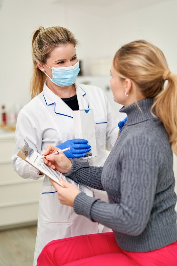 Patient in Clinic Signs Document. Diagnostic and Treatment Procedures ...