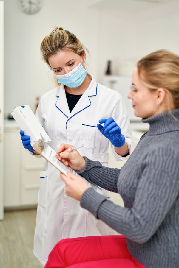Patient in Clinic Signs Document. Diagnostic and Treatment Procedures ...