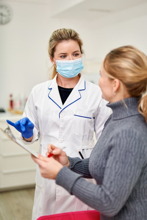 Patient in Clinic Signs Document. Diagnostic and Treatment Procedures ...