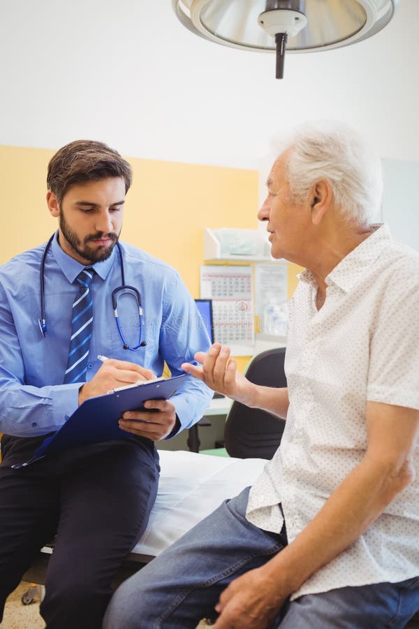Patient Consulting a Doctor Stock Image - Image of care, indoors: 77217913