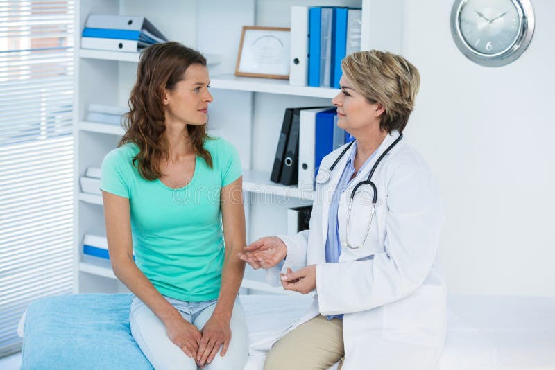 Patient Consulting a Doctor Stock Photo - Image of professional ...