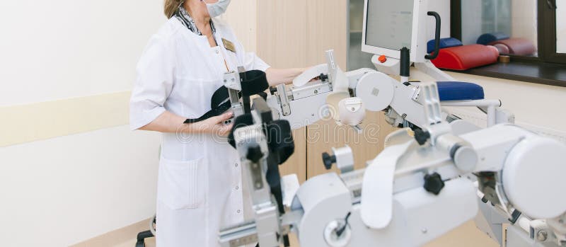 Patient on Continuous Passive Range of Motion Machines. Device To ...