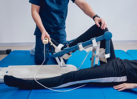 Patient on CPM Machines. Continuous Passive Range of Motion Stock Photo ...