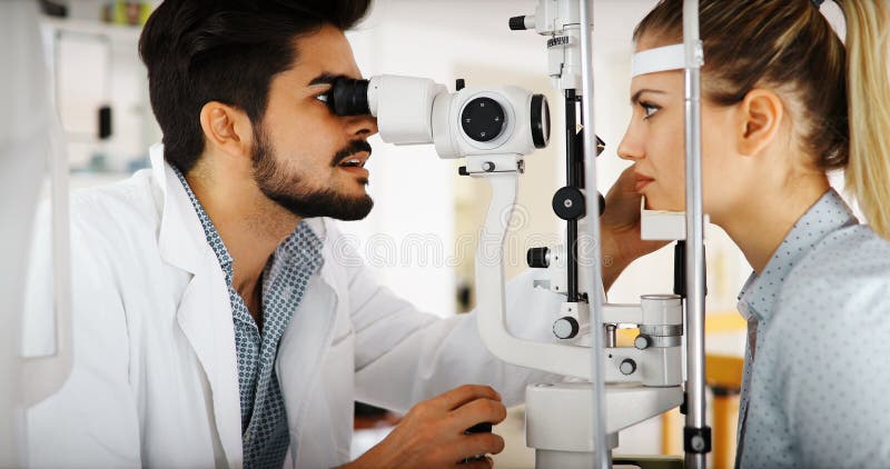 Patient or Customer at Slit Lamp at Optometrist or Optician Stock Photo ...