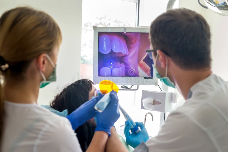 Patient in Dentistry, Doctor Examining Teeth with Camera Stock Image ...