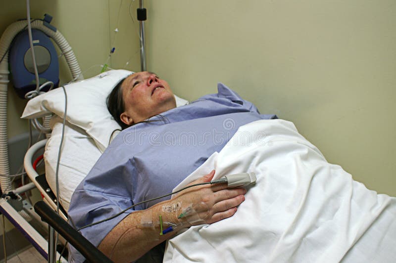 Patient in Emergency Room Bed Stock Image - Image of sick, hospital ...