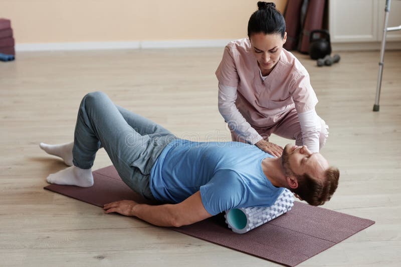 Patient Exercising Together with Therapist Stock Image - Image of ...