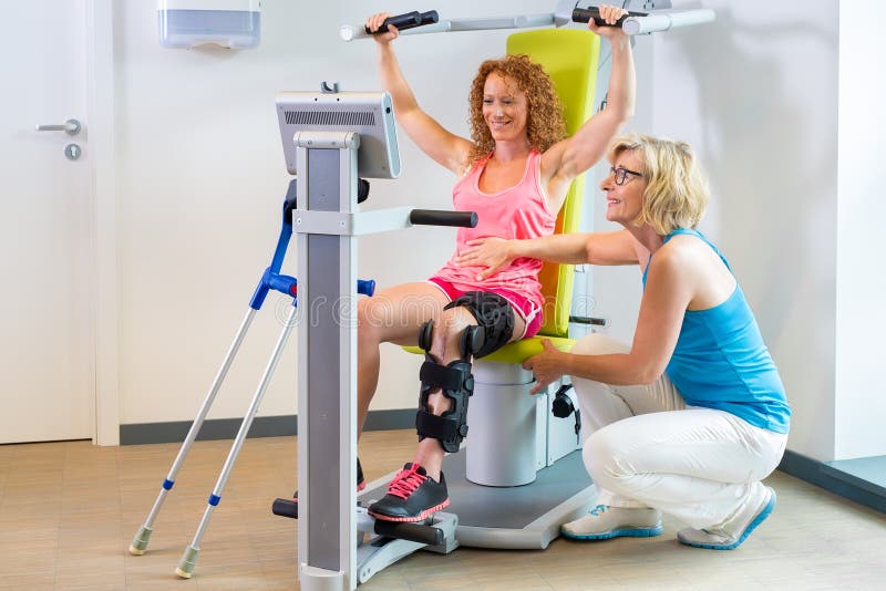 Patient Getting Help with Leg Rehabilitation Stock Photo - Image of ...