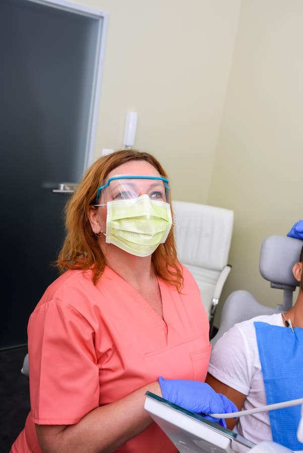 A Patient Getting Treatment in a Dental Studio Stock Image - Image of ...