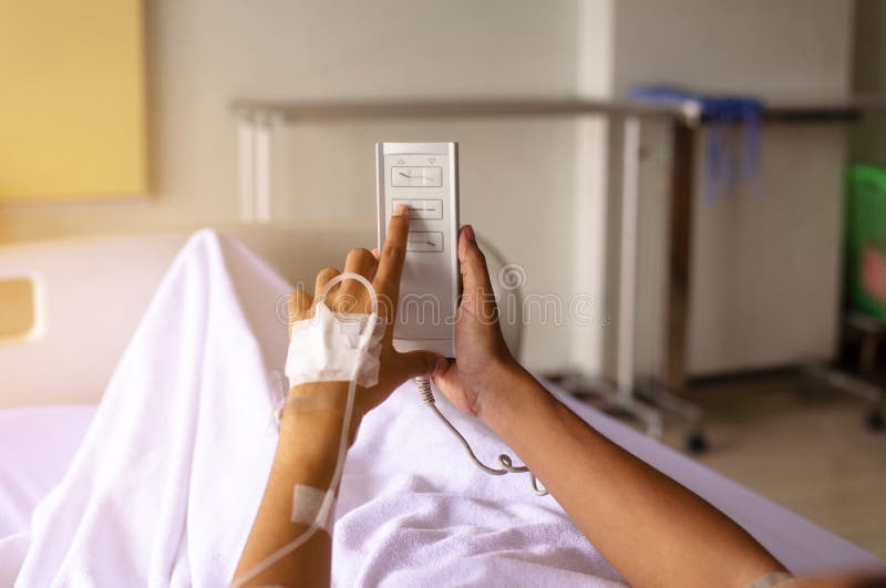 Patient Hands Using Remote for Adjustment Level Sick Bed at Hospital ...
