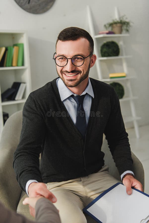 Patient of Happy Psychologist and Patient Shaking Hands Stock Photo ...