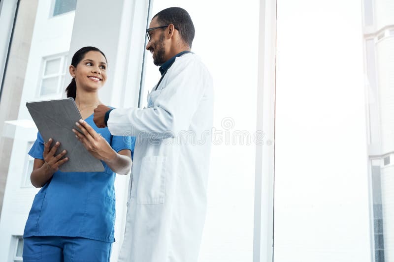 This Patient Has Shown Great Progress. Two Young Doctors Using a ...