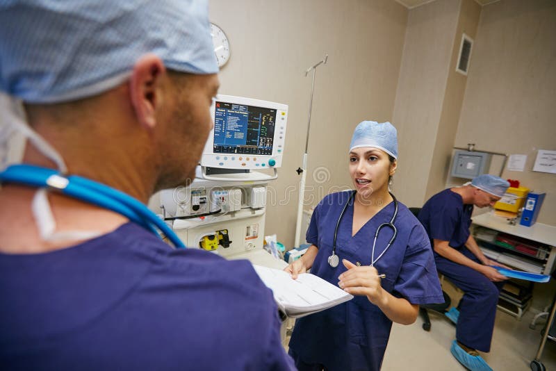 The Patient Has Signed Her Consent Forms. Surgeons Going through ...