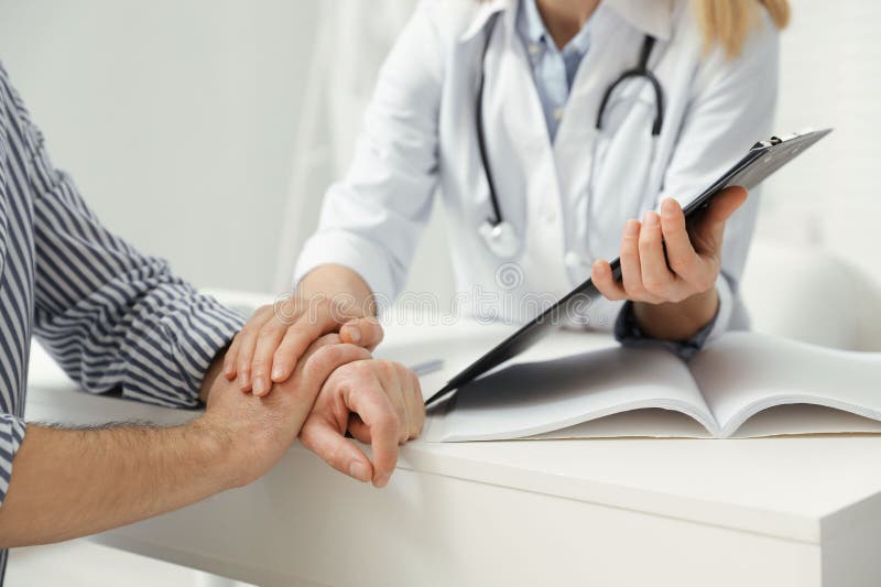 Patient Having Appointment with Doctor in Clinic, Closeup Stock Photo ...