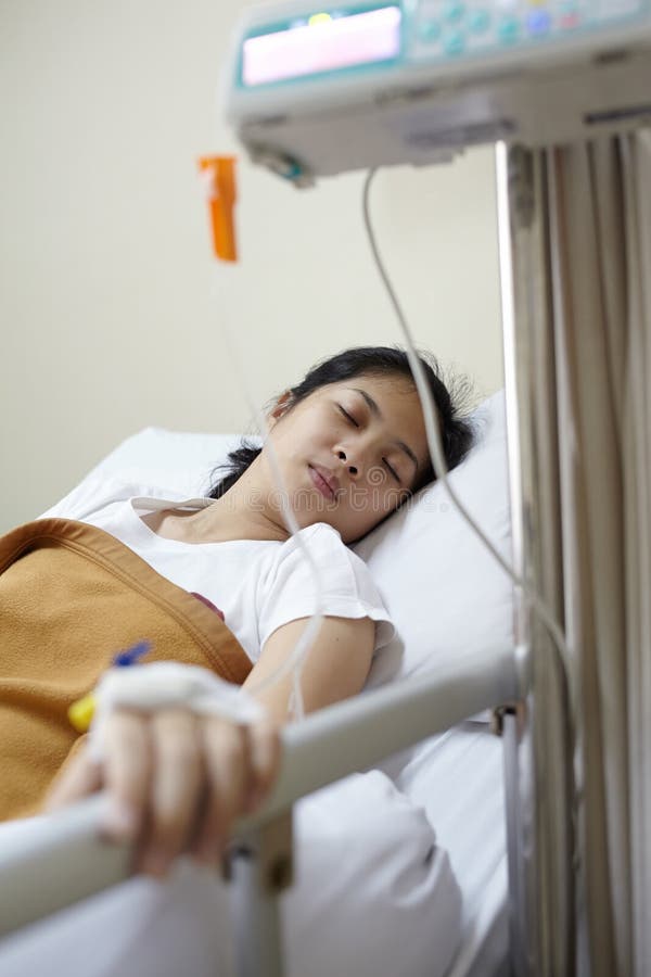 Patient and IV Drip Machine Stock Image - Image of woman, illness: 47327803