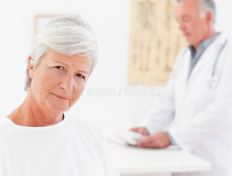 Senior Patient Talking with Doctor Stock Photo - Image of smiling ...