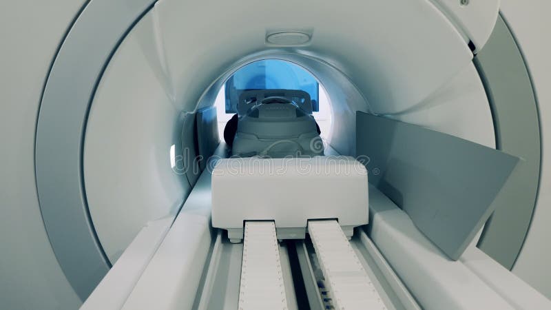 A Patient Lying Inside of an MRI Machine Stock Video - Video of ...
