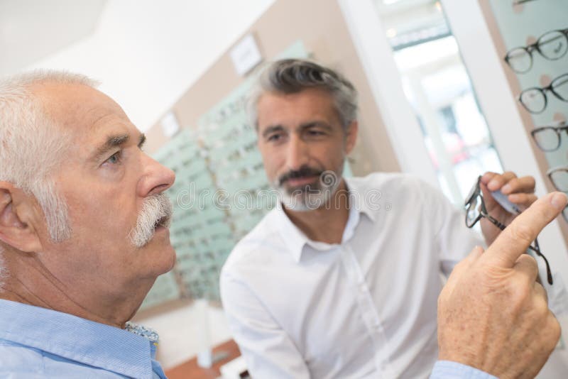 Patient Pointing at Eyeglasses Frame Stock Image - Image of eyecare ...