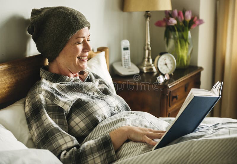 Patient Reading a Book in Bed Stock Image - Image of american ...