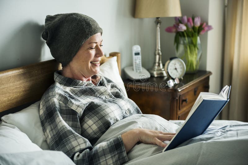 Patient Reading Book in Bed Stock Photo - Image of cheerful, book ...