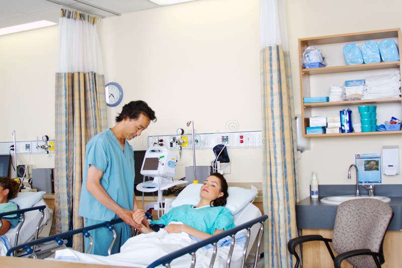Patient in recovery room stock photo. Image of nurse - 35740390