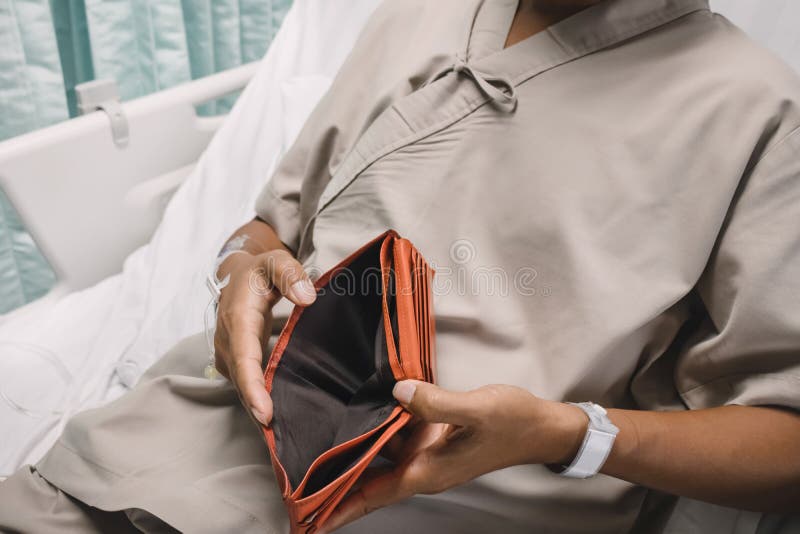 Patient Showing Empty Wallet in Hospital Stock Image - Image of ...