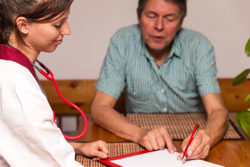 Patient is Signing a Document Stock Image - Image of grandfather ...