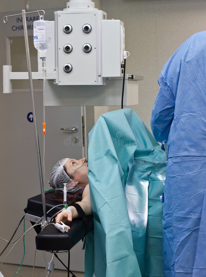 Patient during surgery stock photo. Image of illness - 32649304