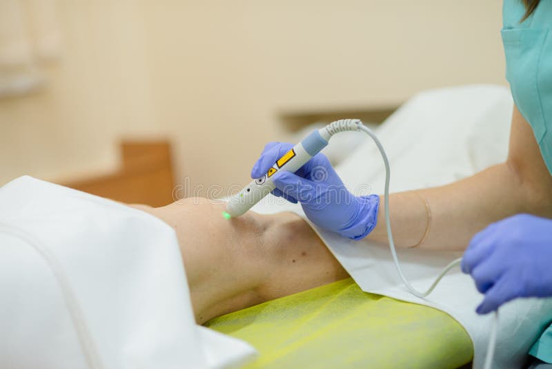 Patient Treatment with Laser Magnetotherapy Stock Photo - Image of ...