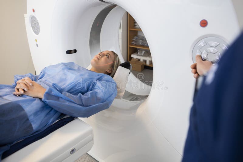 Patient Undergoing CT Scan in Hospital Stock Photo - Image of people ...