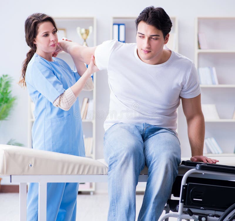 Patient Undergoing Rehabilitation Recovery Programme with Doctor Stock ...