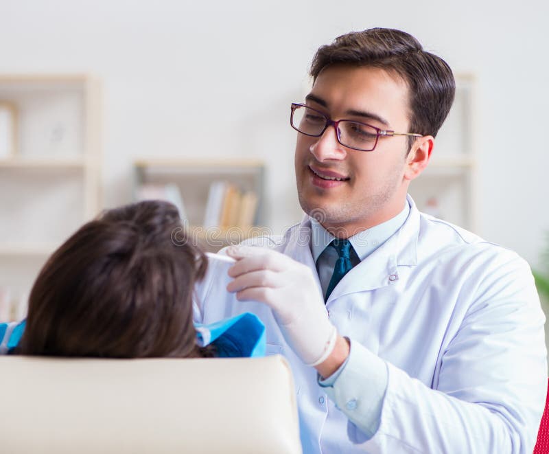 Patient Visiting Dentist for Regular Check-up and Filling Stock Photo ...
