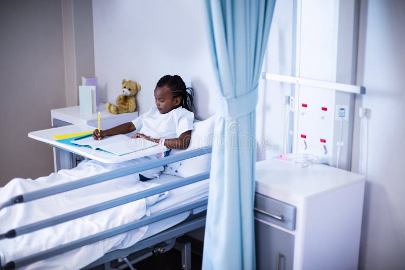 Patient Writing on the Book while Sitting Stock Image - Image of health ...