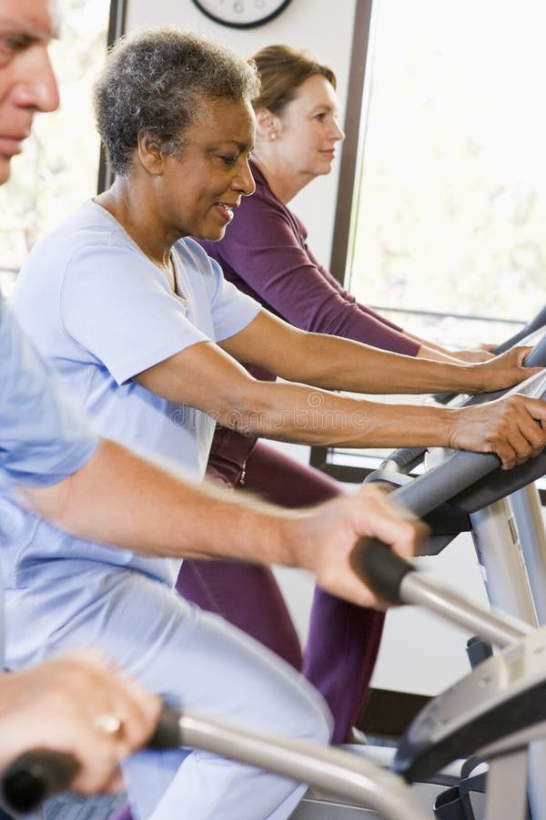 Patients in Rehabilitation with Exercise Machines Stock Image - Image ...