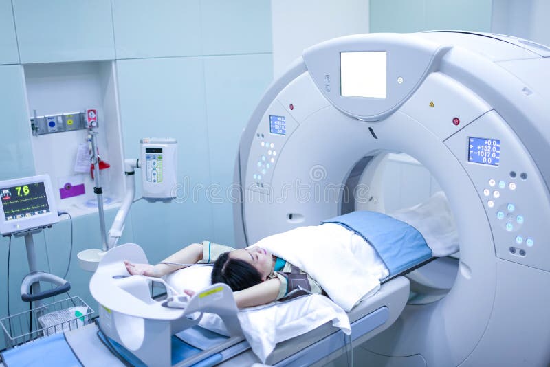Patients Screening on CT Scanner. Man Undergoing CT Scan while Doctor`s ...