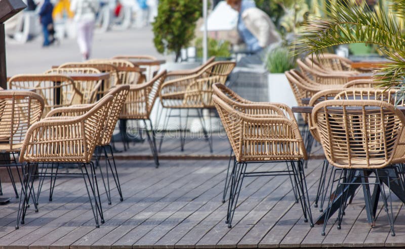 A Patio with Many Chairs and Tables Stock Image - Image of patio, style ...