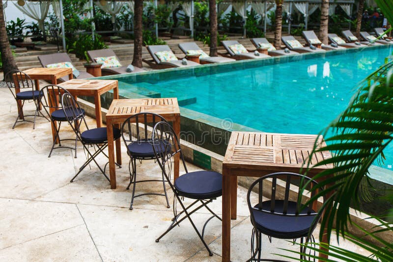 Patio near pool stock photo. Image of hotel, lifestyle - 77299646
