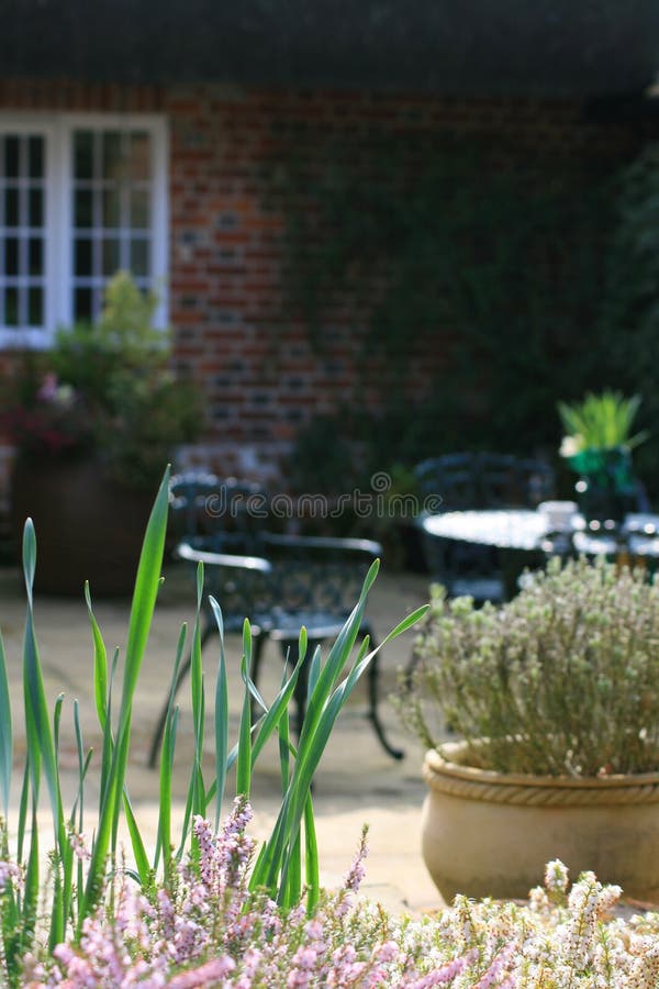 Patio Scene stock photo. Image of outdoors, brick, flowers - 8661664